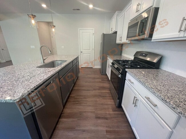 Lovely 4 Bedroom 2-Car Garage Home with Guest Suite in Main Level ...