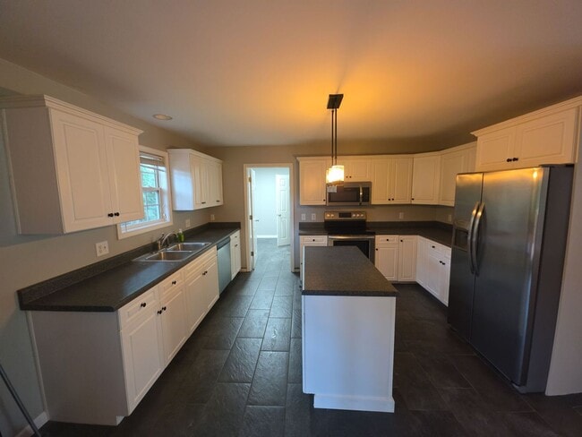 Bright 3 Bedroom Home with Basement, Backyard, and Garage Off-Campus ...